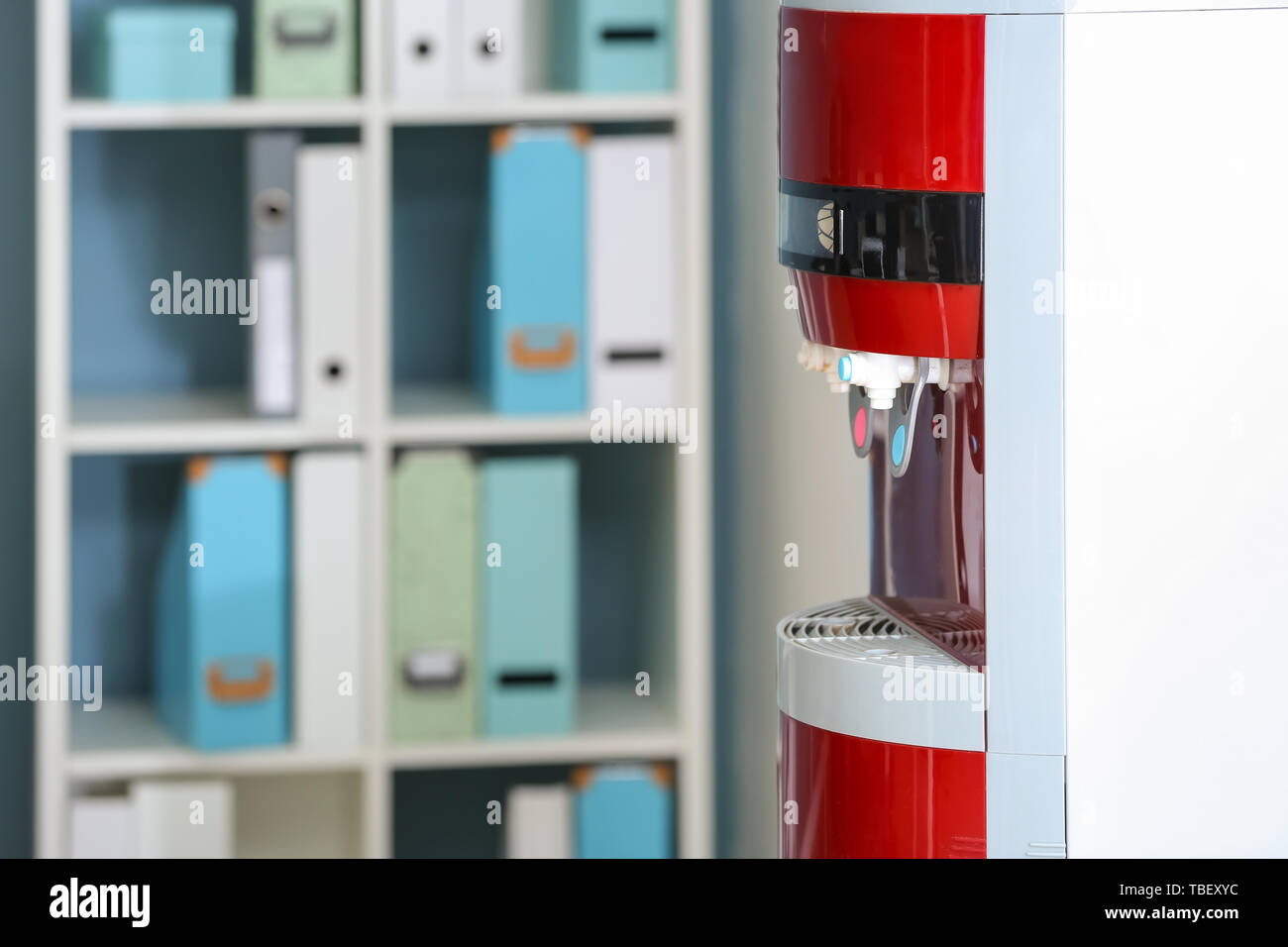 Modern water cooler in office, closeup Stock Photo - Alamy