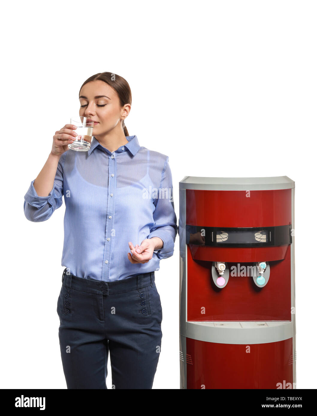 Woman drinking water from cooler on white background Stock Photo - Alamy
