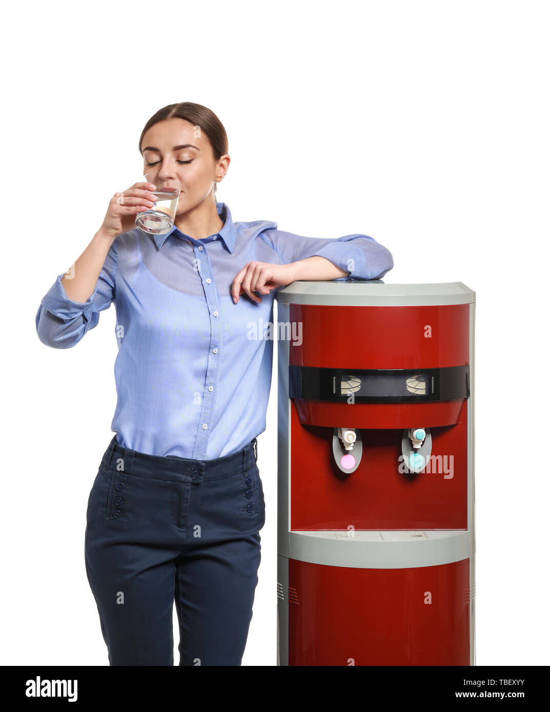 Woman drinking water from cooler on white background Stock Photo - Alamy