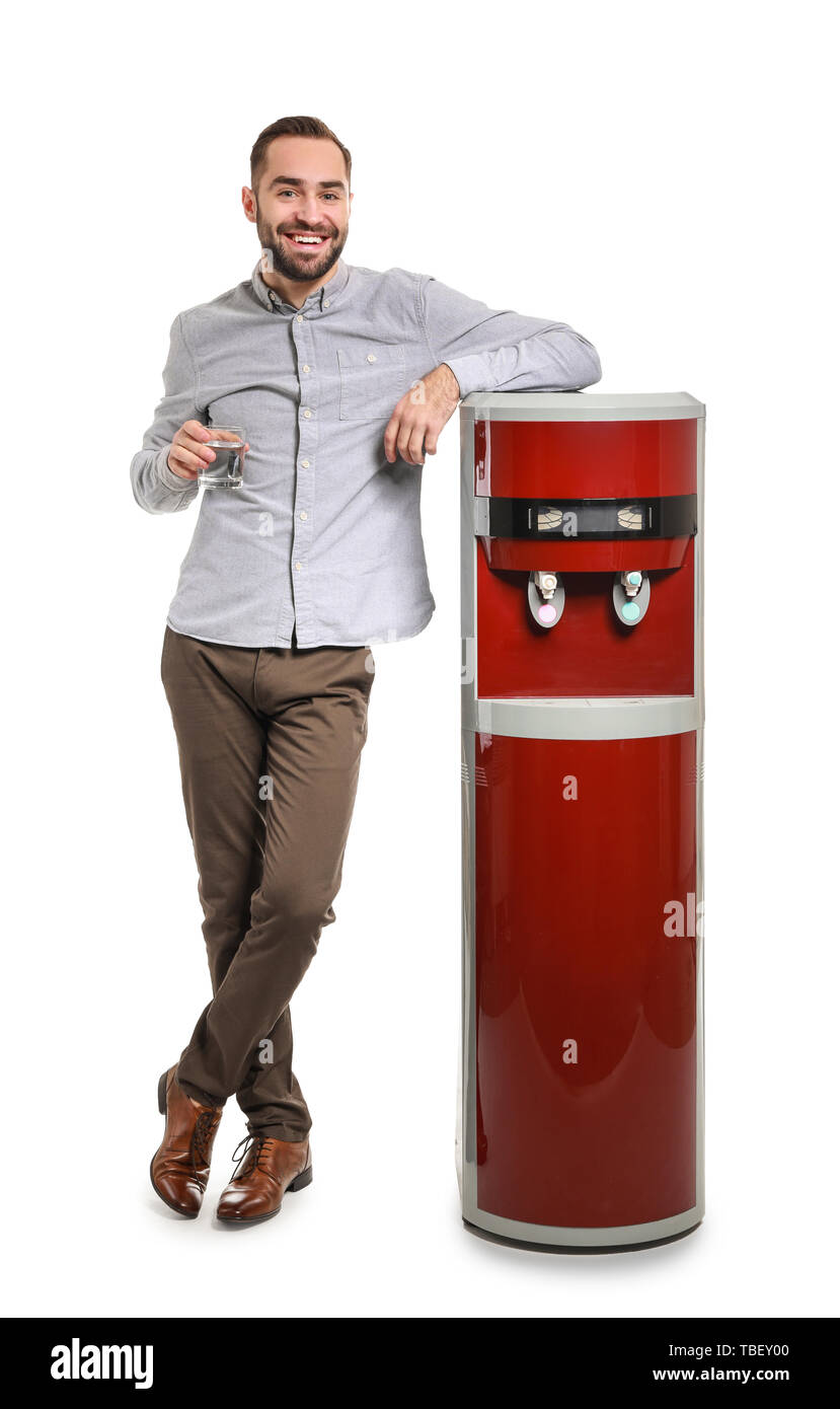 Man near water cooler on white background Stock Photo - Alamy