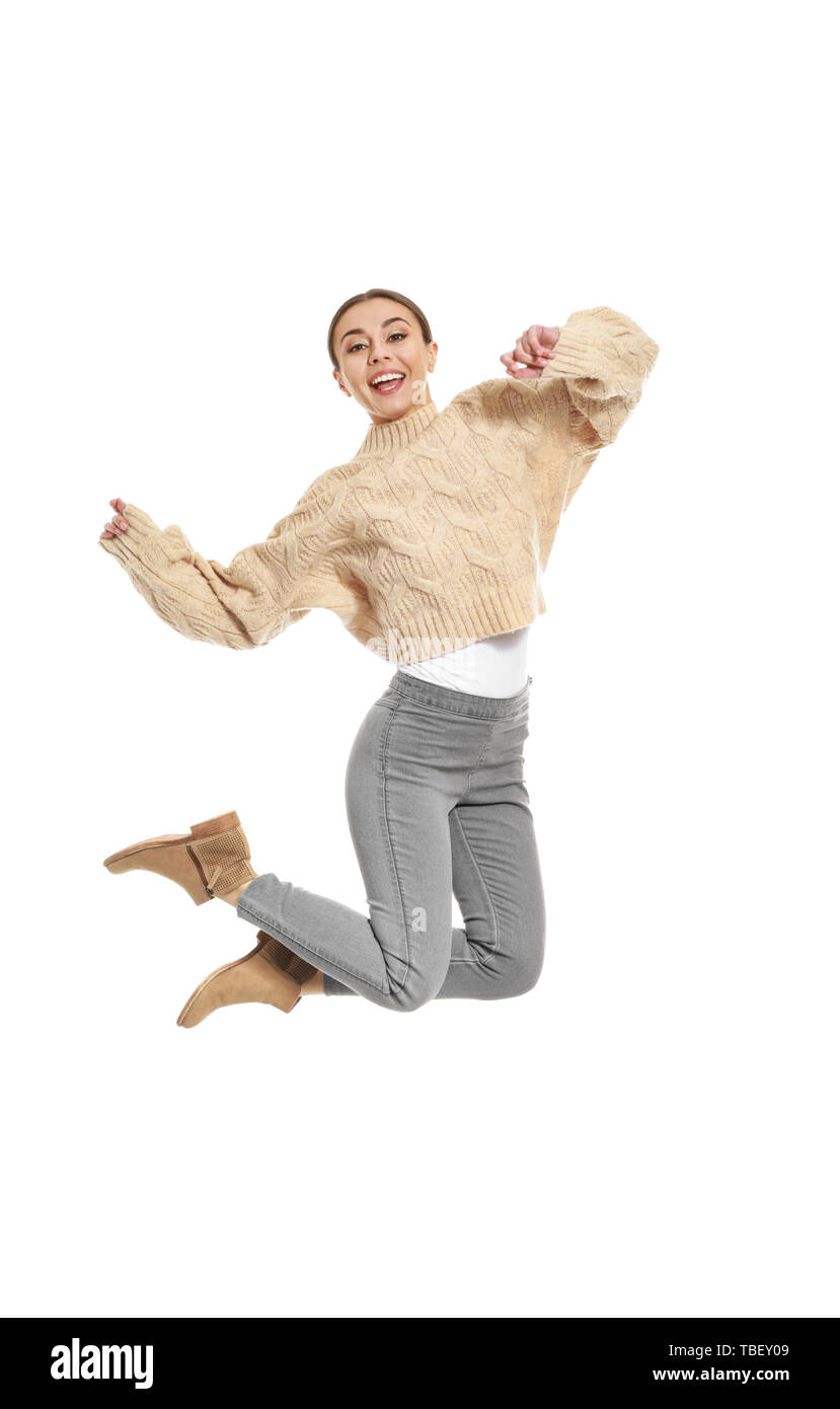 Happy jumping woman on white background Stock Photo - Alamy