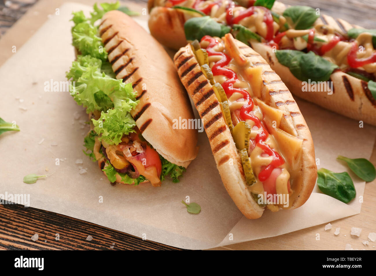 Tasty hot dogs on table Stock Photo - Alamy