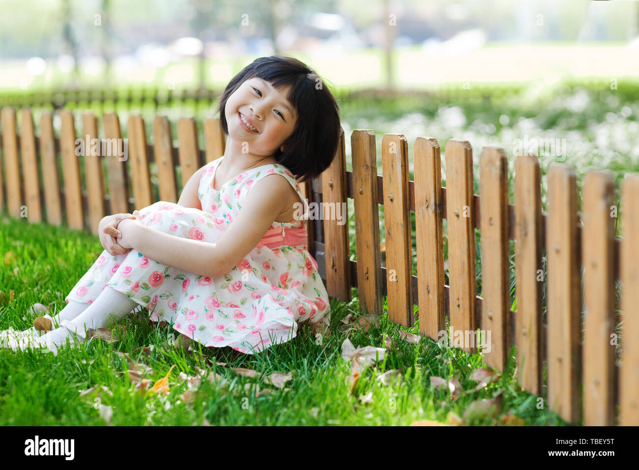 a girl playing outdoors Stock Photo - Alamy