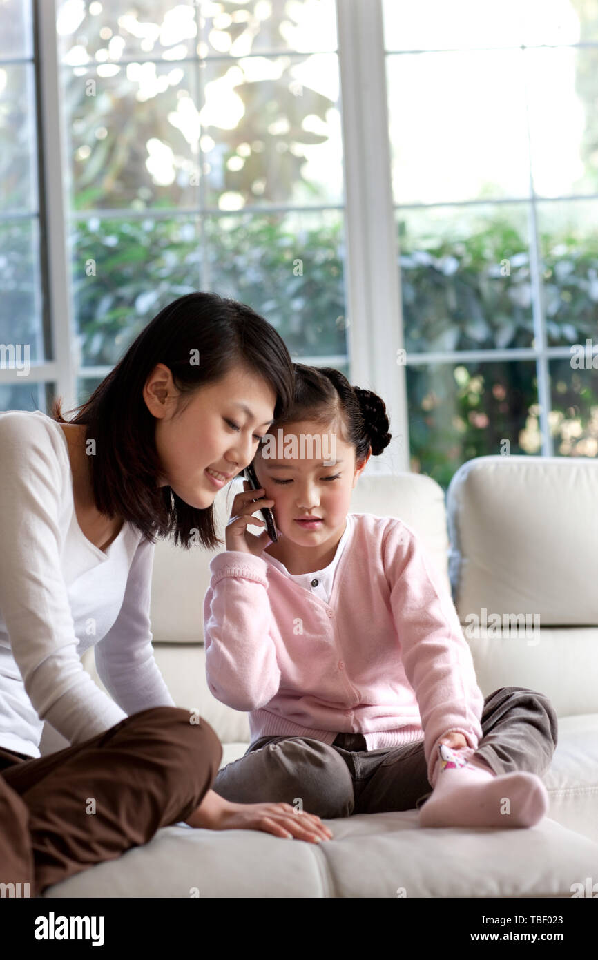 Parent - child interaction in a family Stock Photo - Alamy