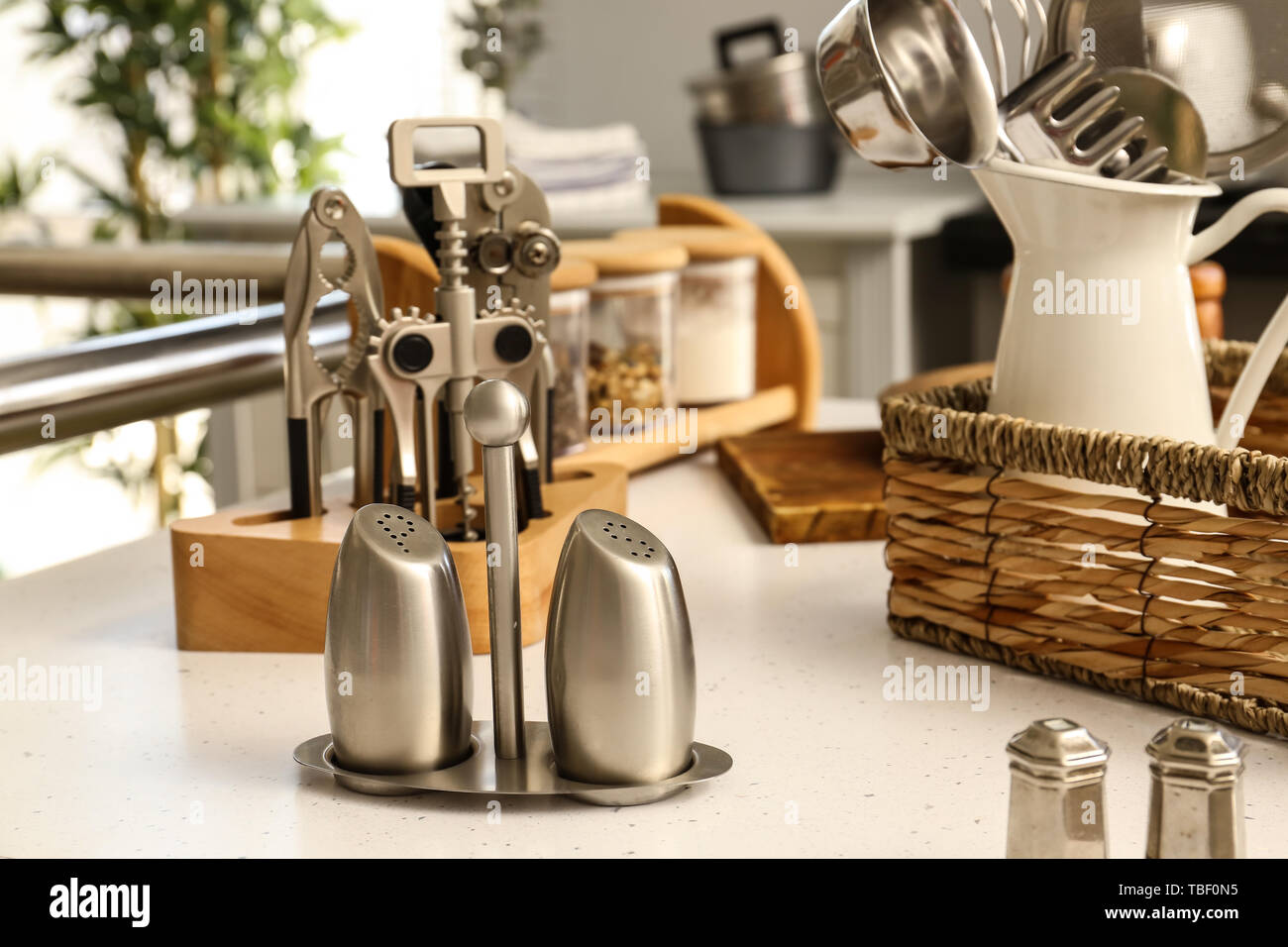 Set of kitchen utensils on table Stock Photo - Alamy