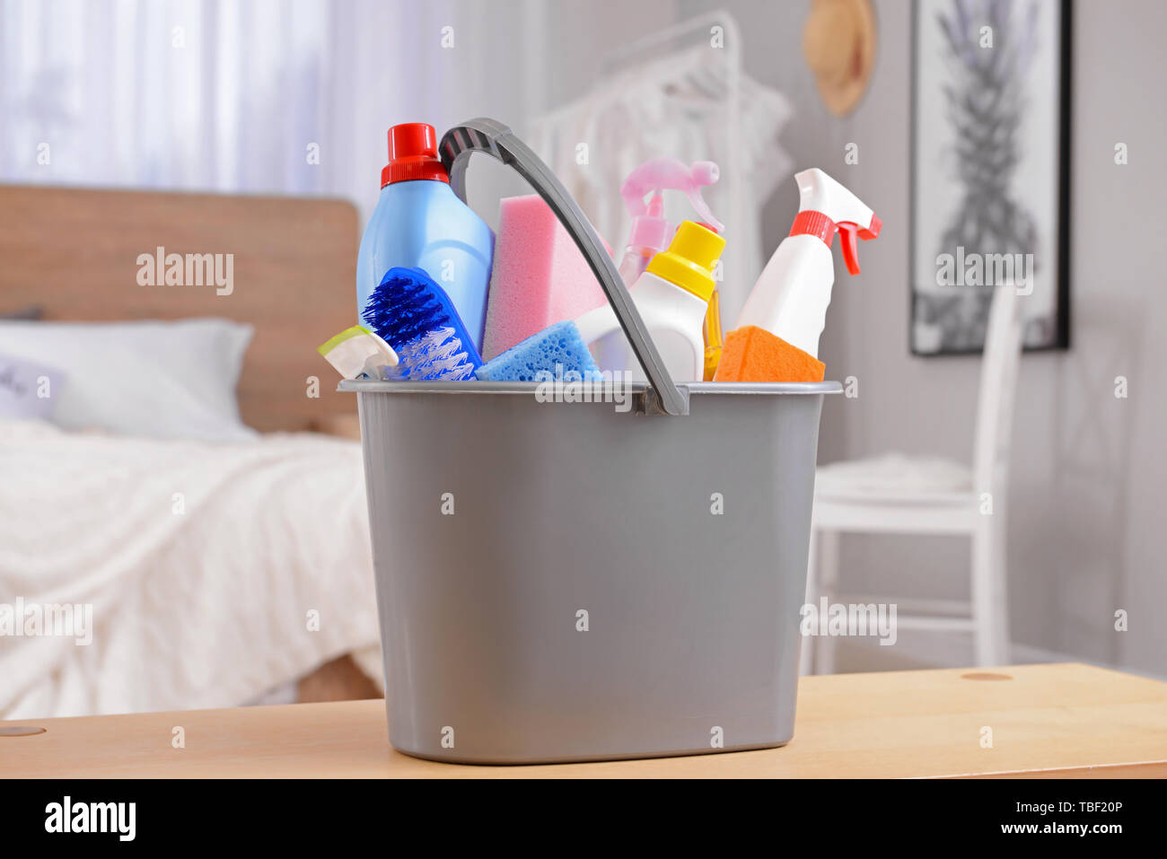 Set of cleaning supplies on table in flat Stock Photo - Alamy