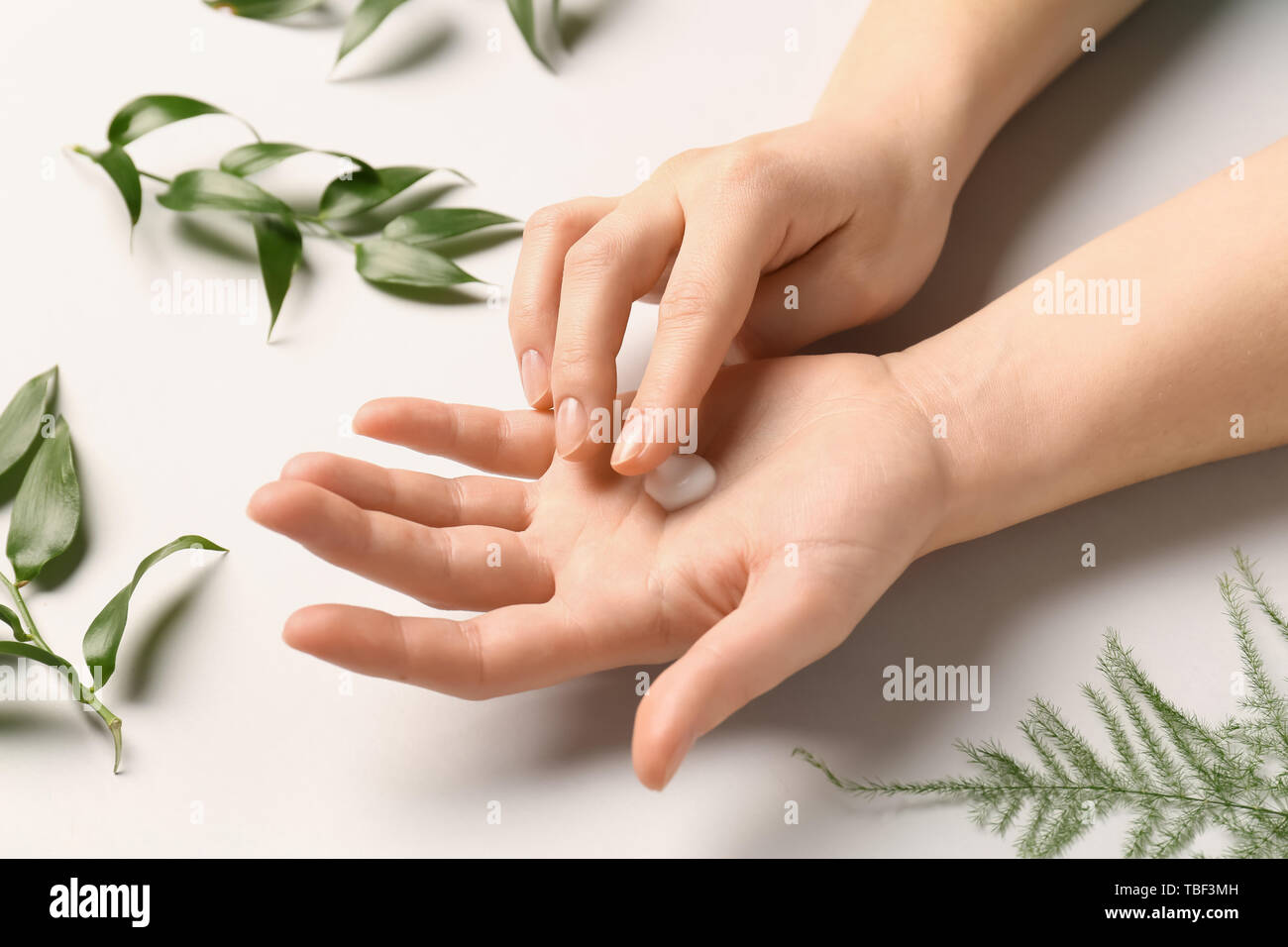 Female hands cream tropical hi-res stock photography and images - Alamy