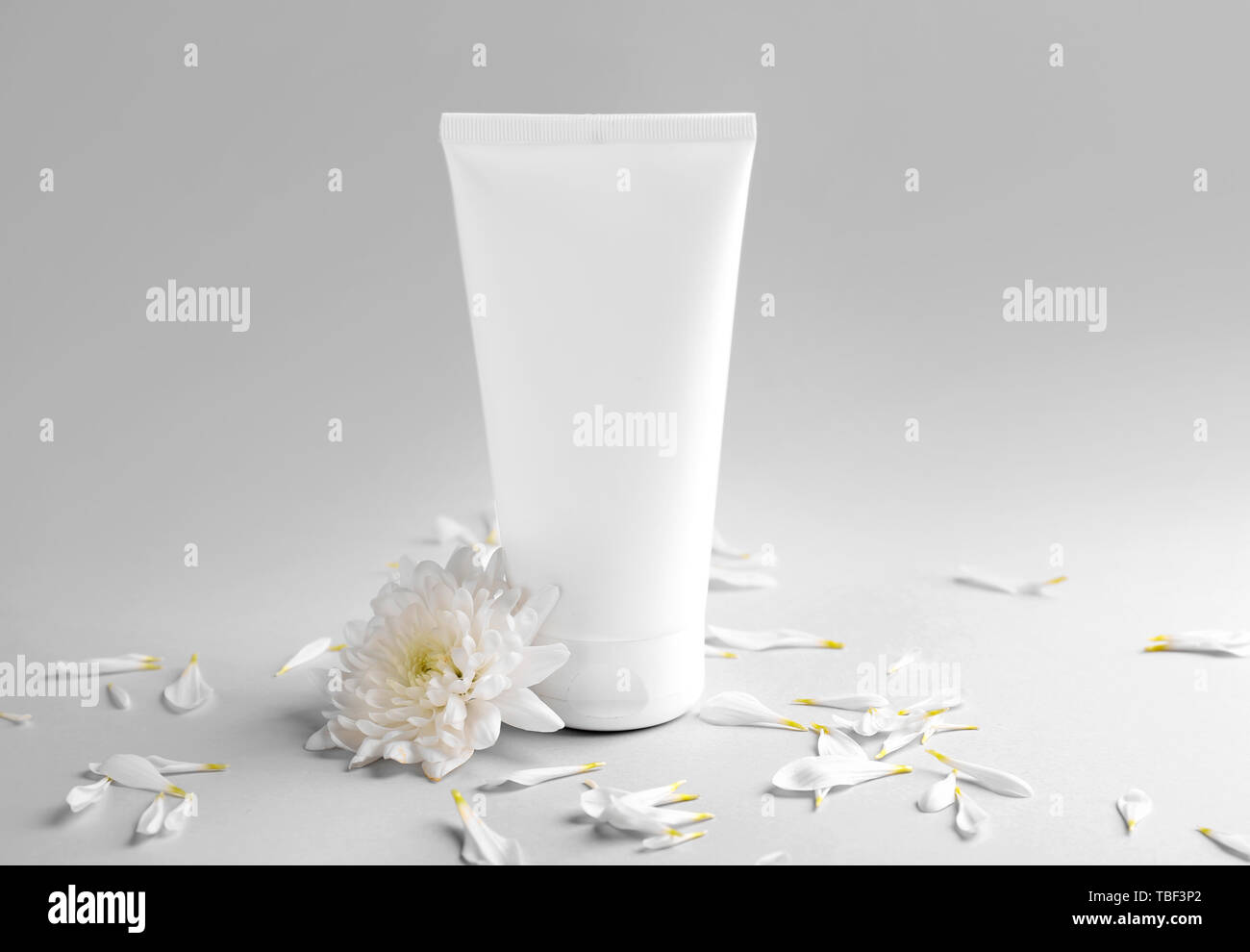 Tube with natural cream on light background Stock Photo - Alamy