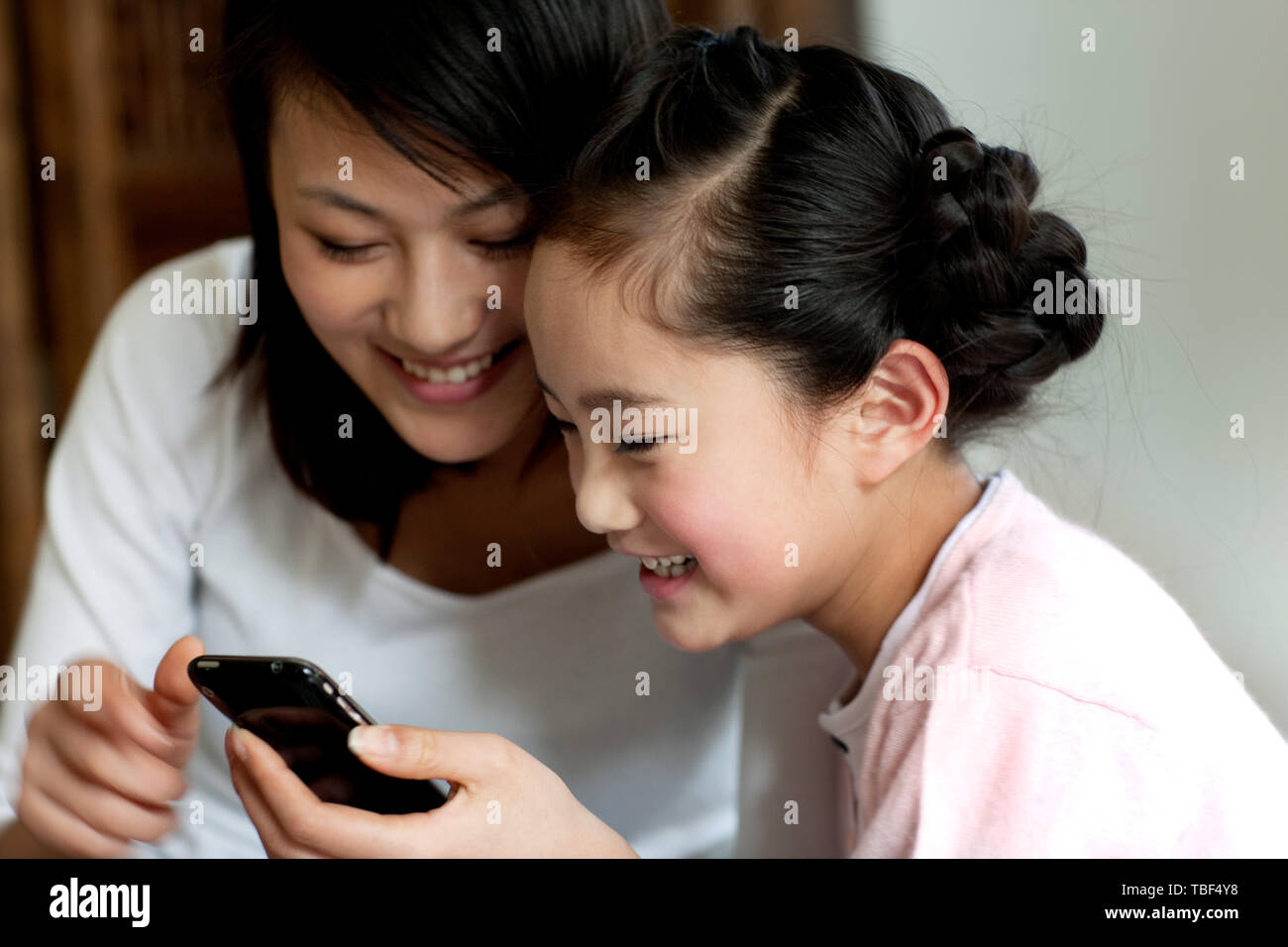 Parent - child interaction in a family Stock Photo - Alamy