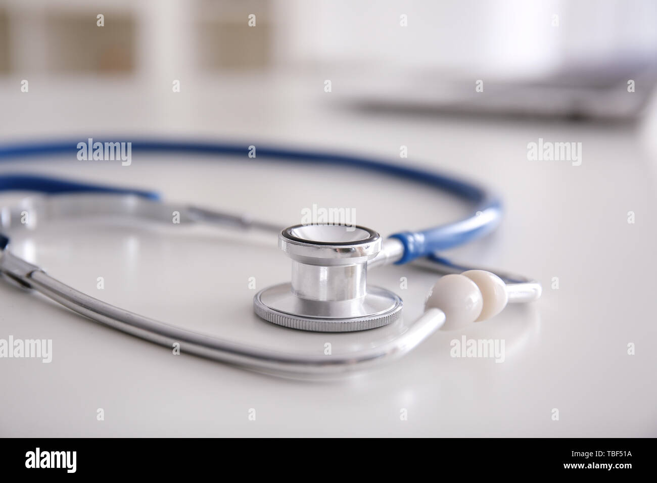 Stethoscope on doctor's table, closeup Stock Photo - Alamy