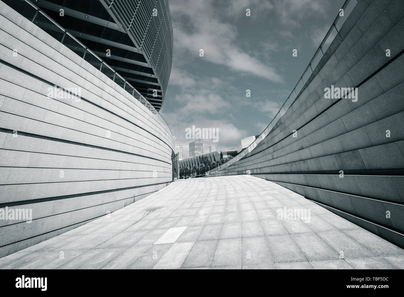 Modern building exterior and empty footpath floor Stock Photo - Alamy
