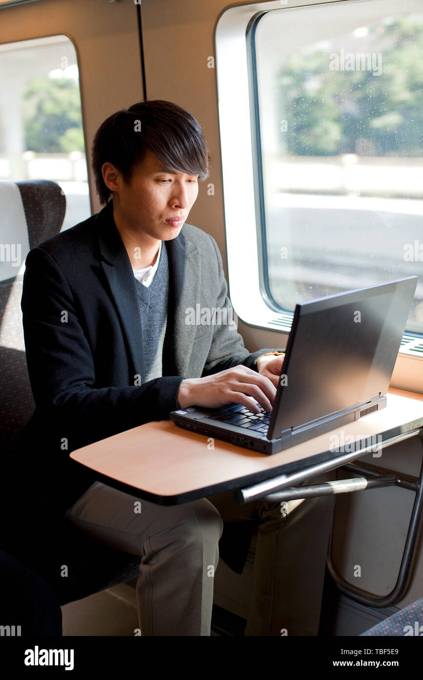 Laptop on train car hi-res stock photography and images - Alamy