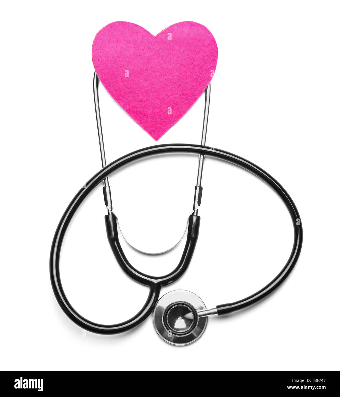 Stethoscope and pink heart on white background. Cardiology concept ...