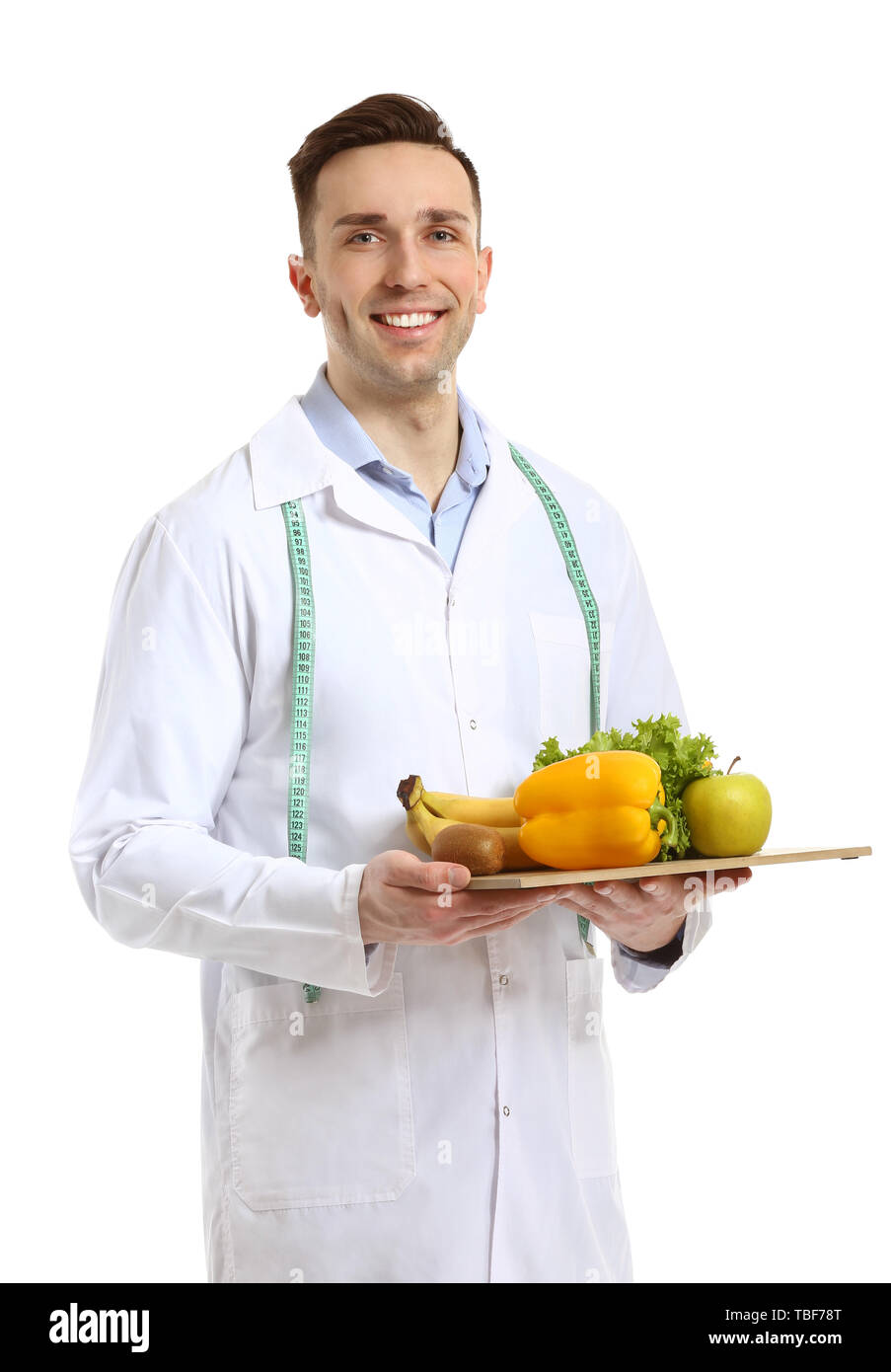 Portrait of male nutritionist on white background Stock Photo - Alamy