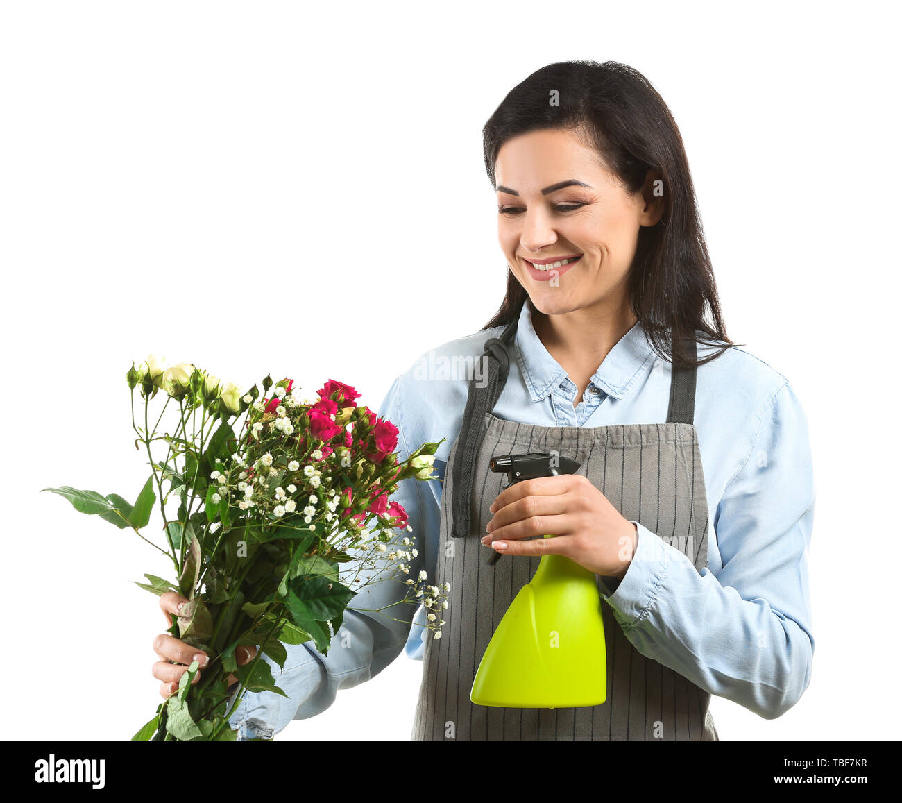 Beautiful female florist with bouquet of flowers on white background ...