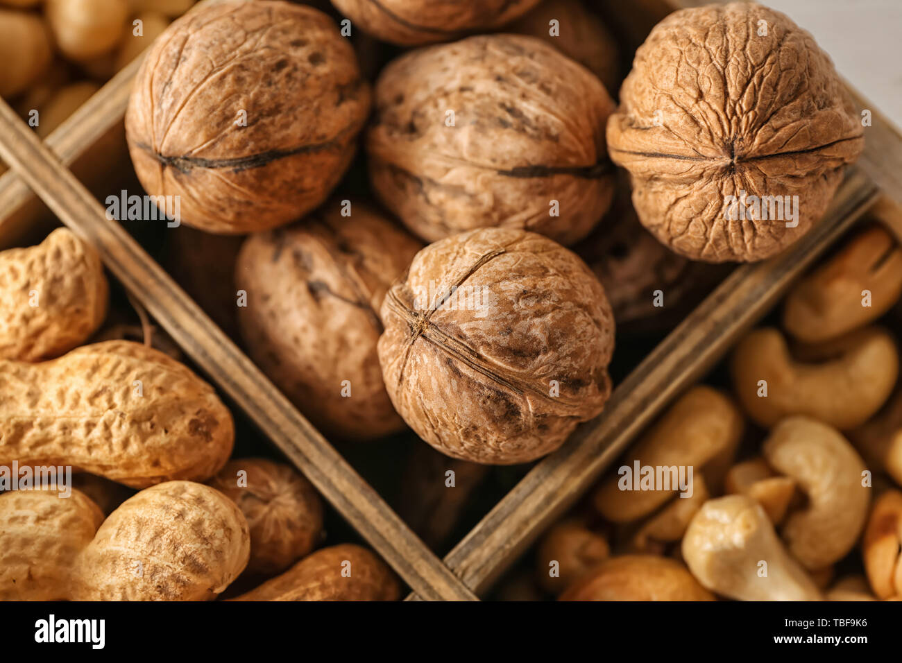 Box different tasty nuts hi-res stock photography and images - Alamy