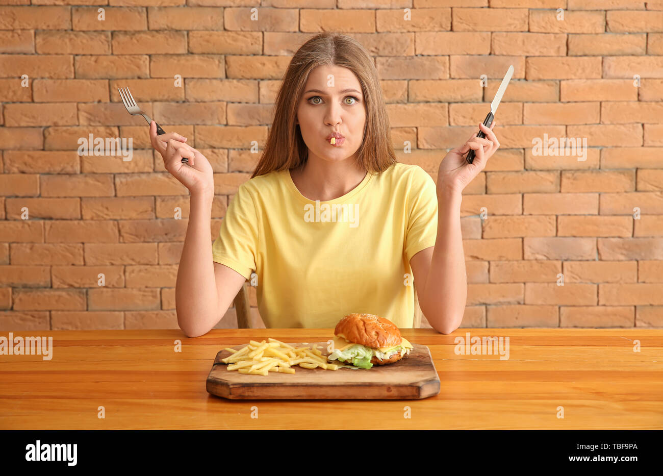 Funny woman eating hi-res stock photography and images - Alamy