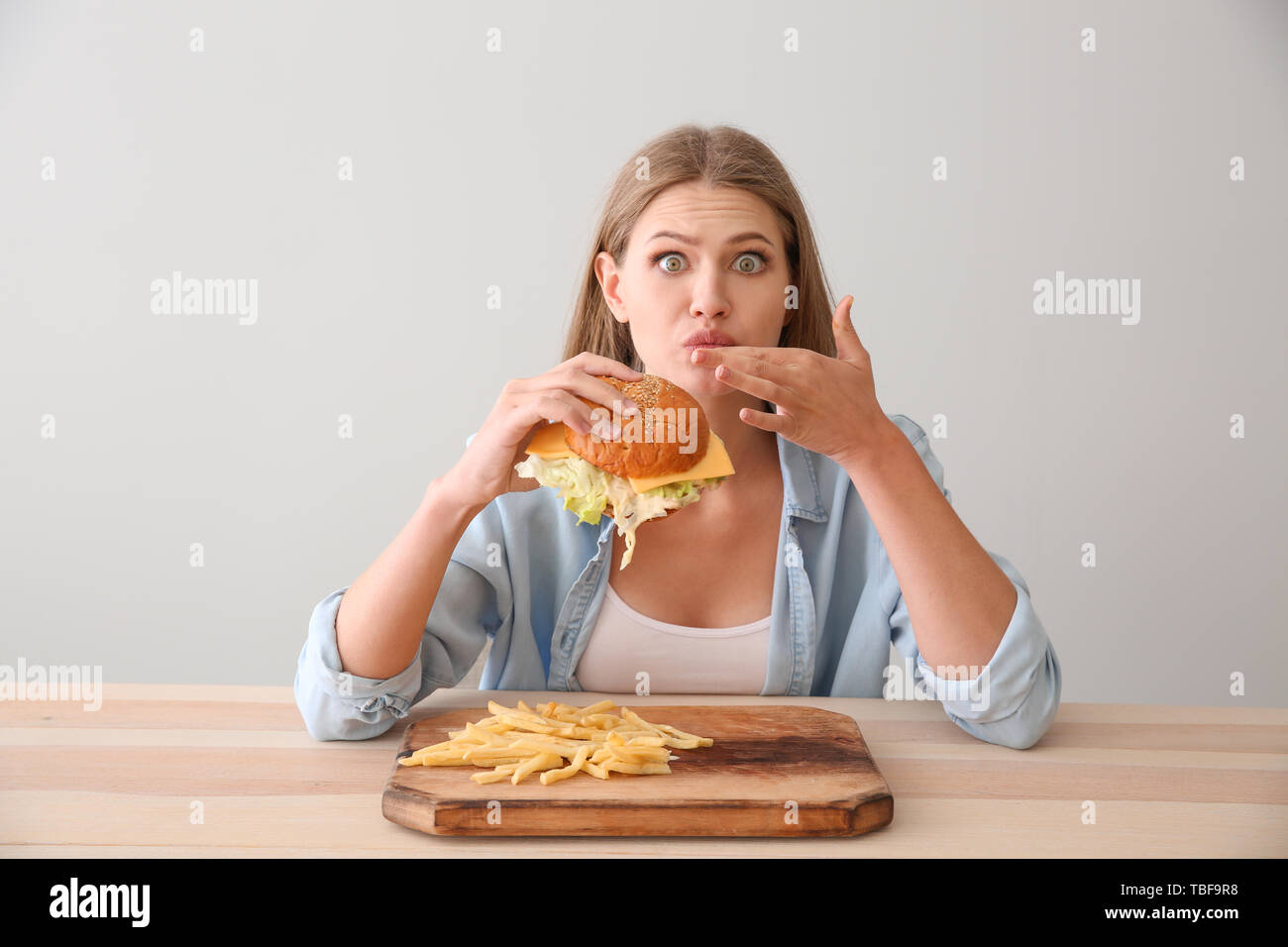 Funny woman eating hi-res stock photography and images - Alamy