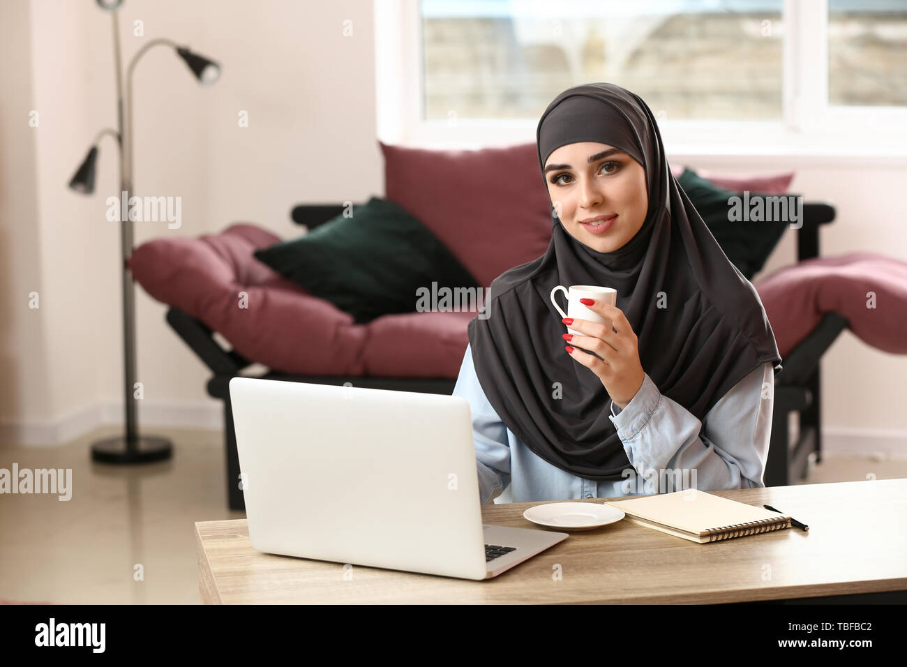 Muslim woman working in hi-res stock photography and images - Alamy