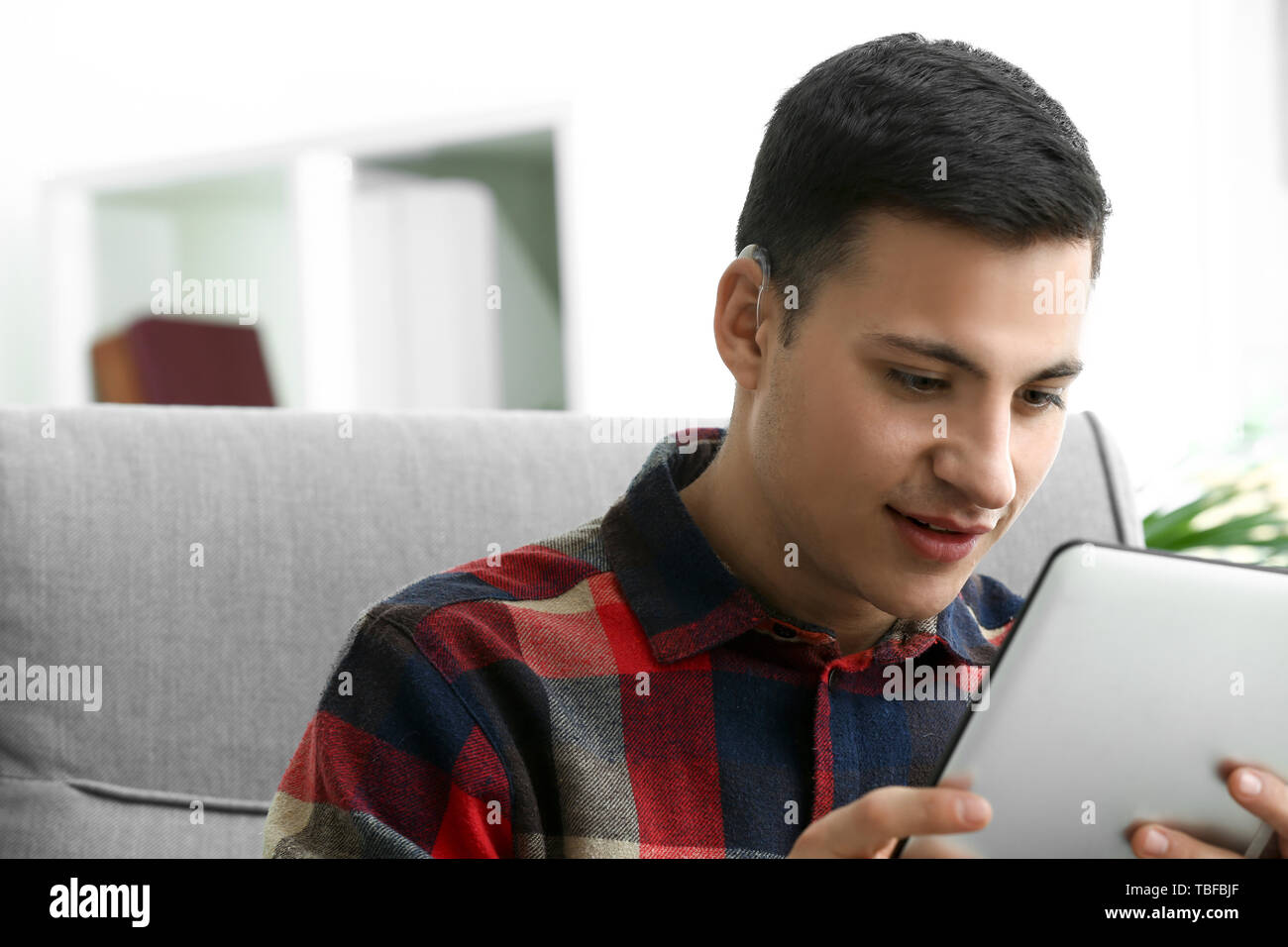 Computer person hearing aid hi-res stock photography and images - Alamy