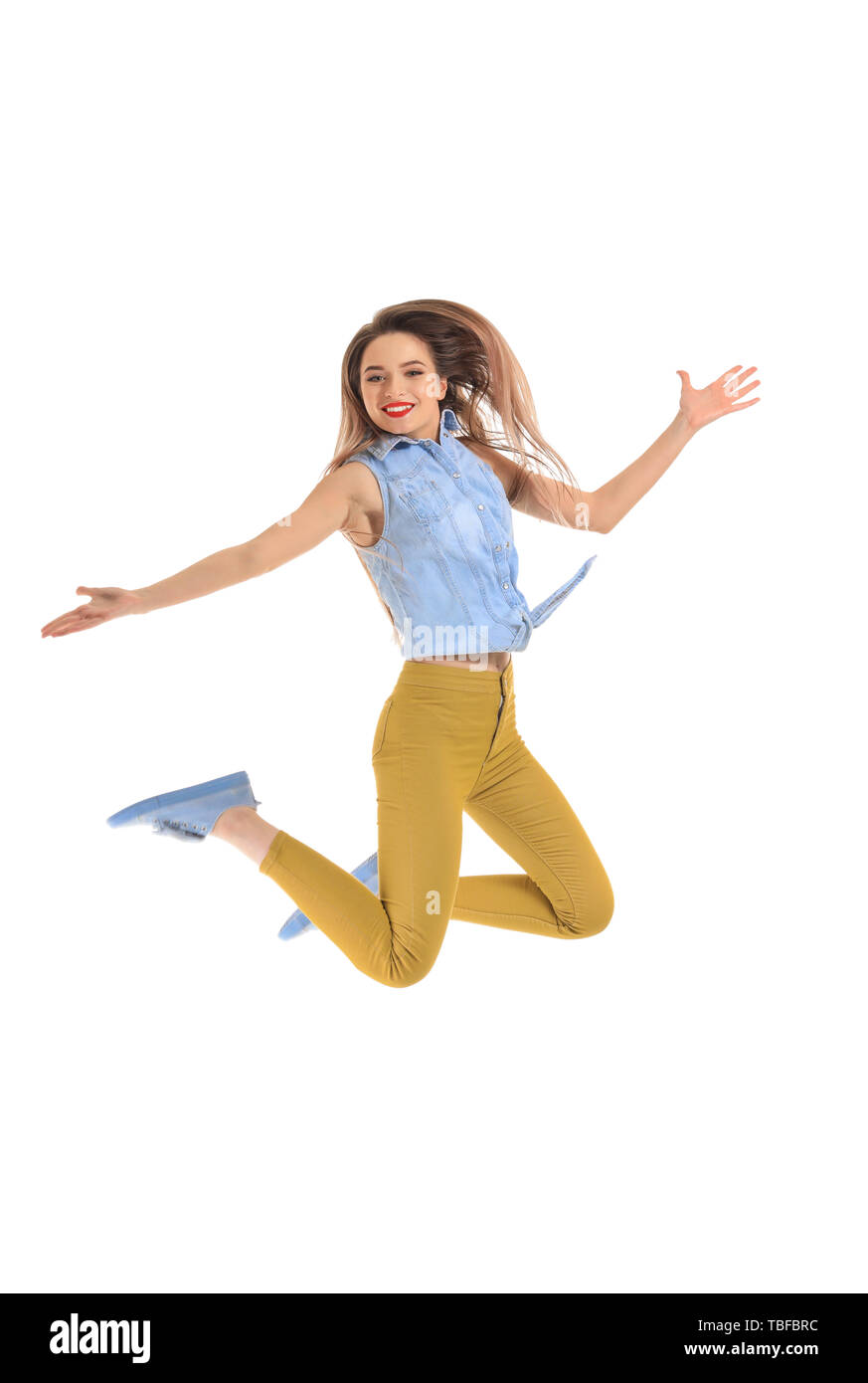 Happy jumping woman on white background Stock Photo - Alamy