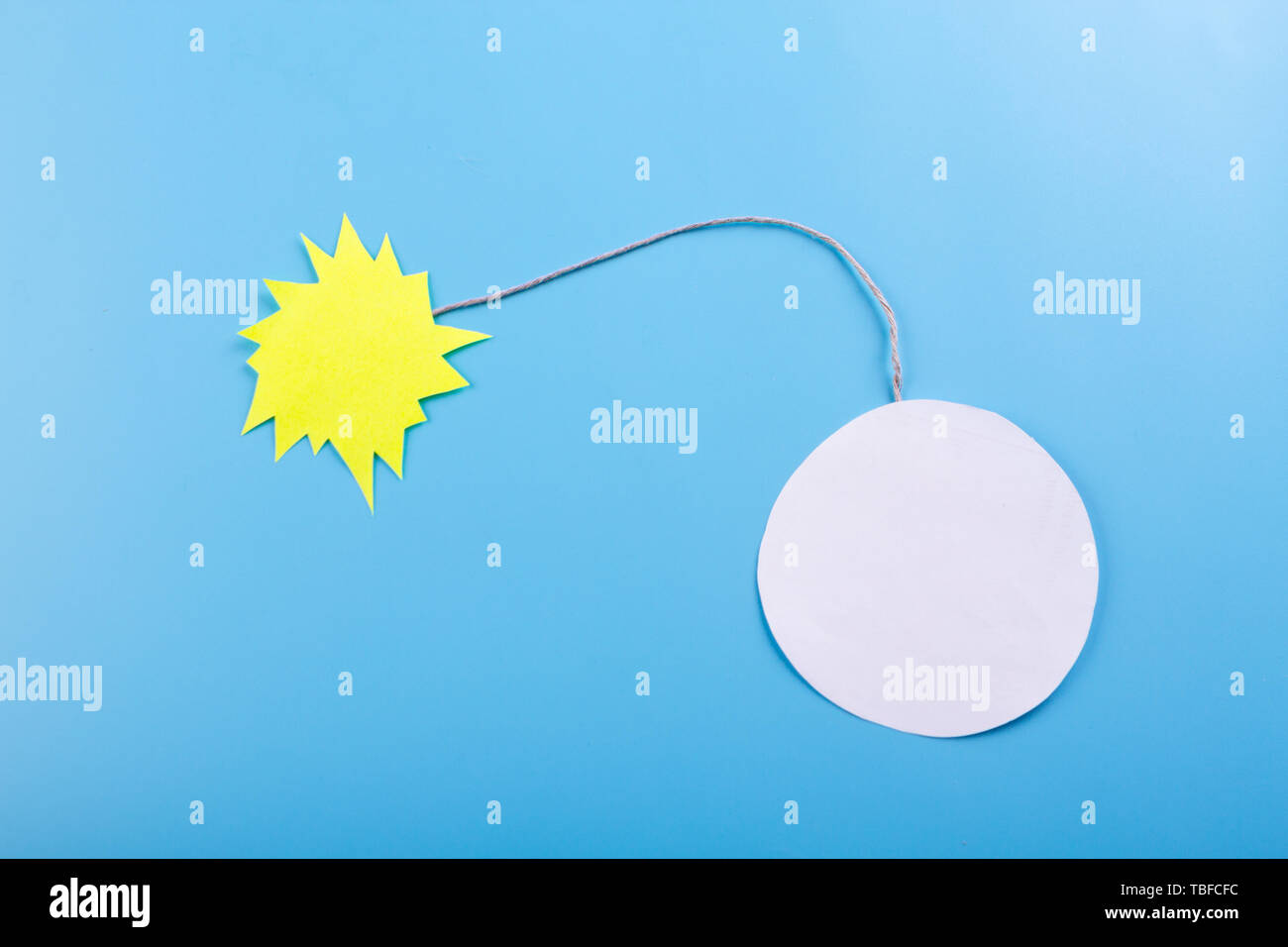 bomb cartoon styled on the blue background Stock Photo - Alamy