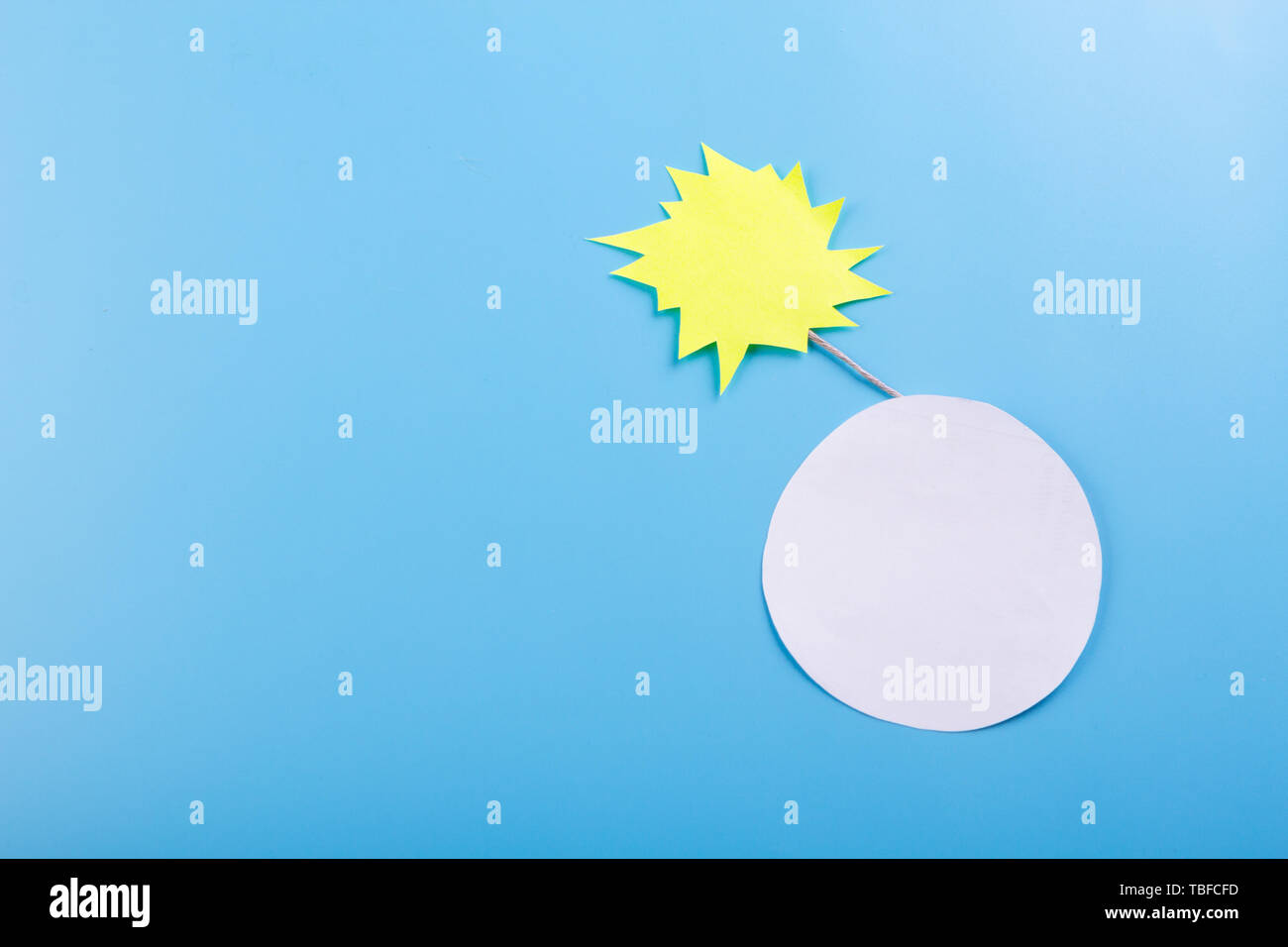 bomb cartoon styled on the blue background Stock Photo - Alamy