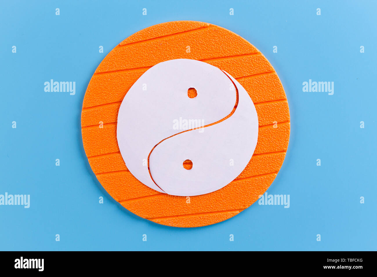 Yin Yang Symbol on orange background. cartoon style Stock Photo - Alamy