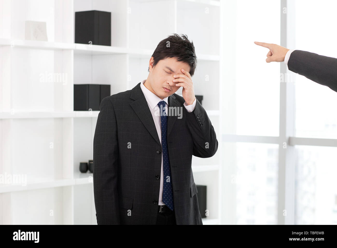 The look on a business person's face when they're scolded Stock Photo ...