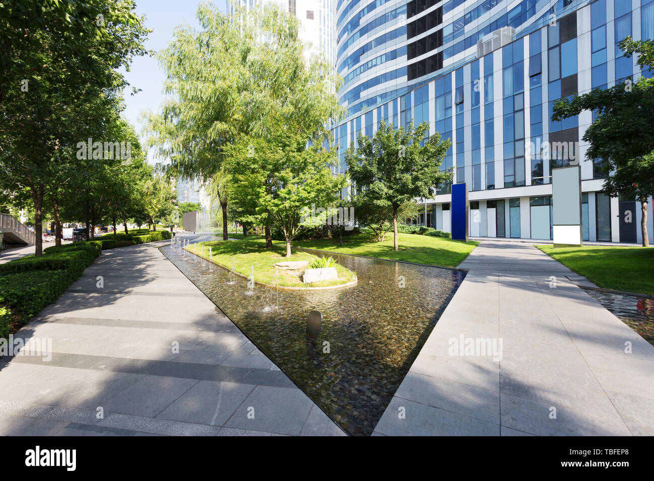 footpath around modern office building Stock Photo - Alamy