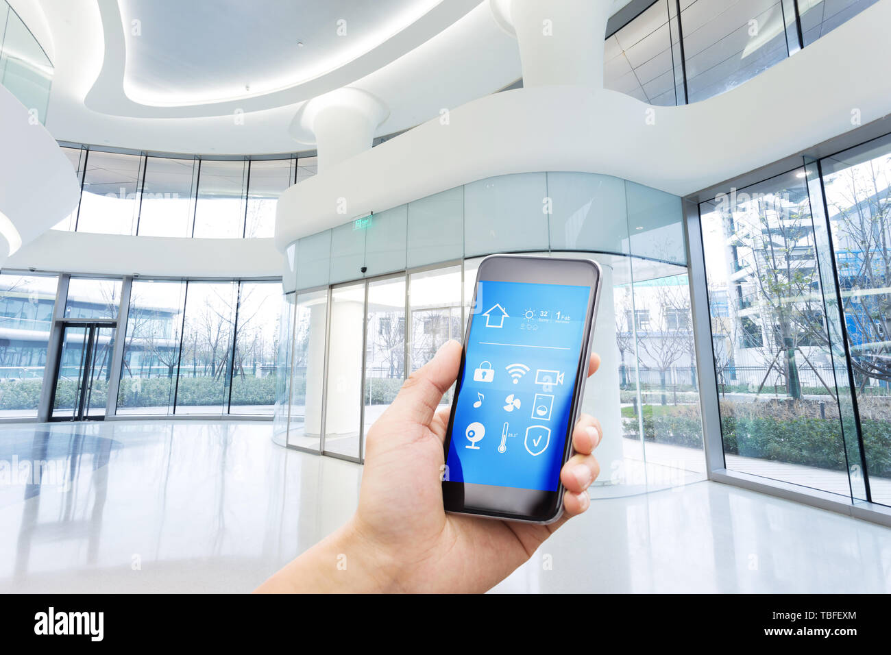 smart phone with smart home with modern hall Stock Photo - Alamy