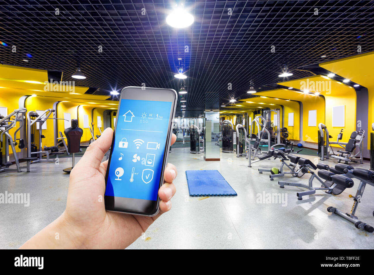 smart phone with smart home with modern gym Stock Photo - Alamy