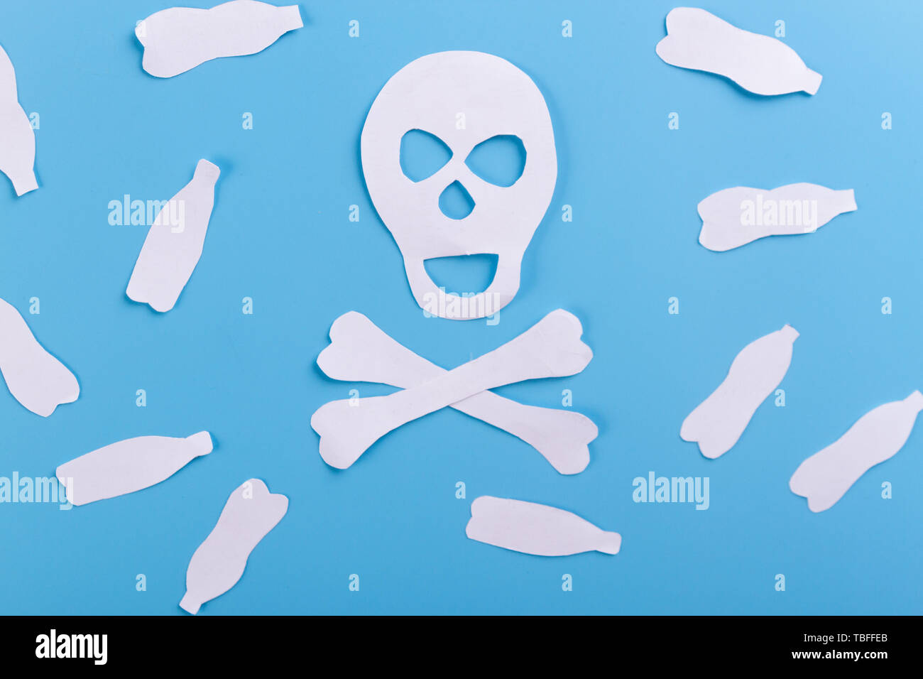 plastic pollution issue concept on blue background Stock Photo - Alamy