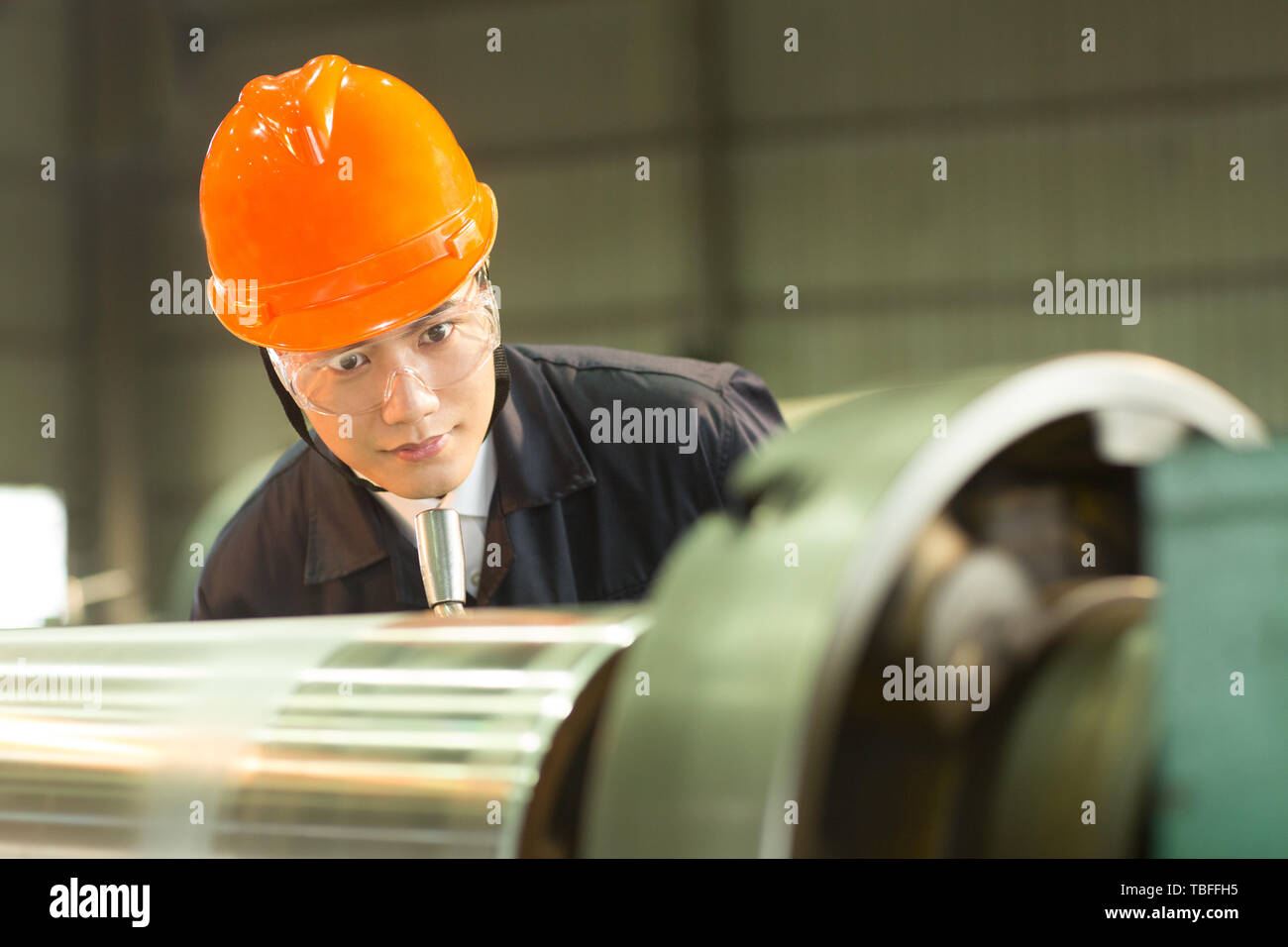 Manufacturing workers work in the workshop Stock Photo - Alamy