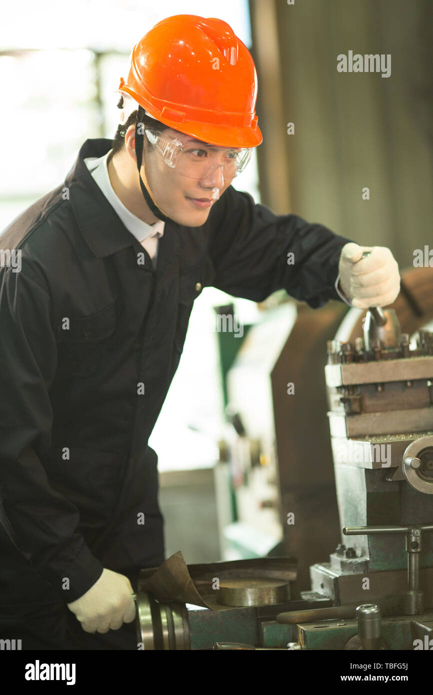 Manufacturing workers work in the workshop Stock Photo - Alamy