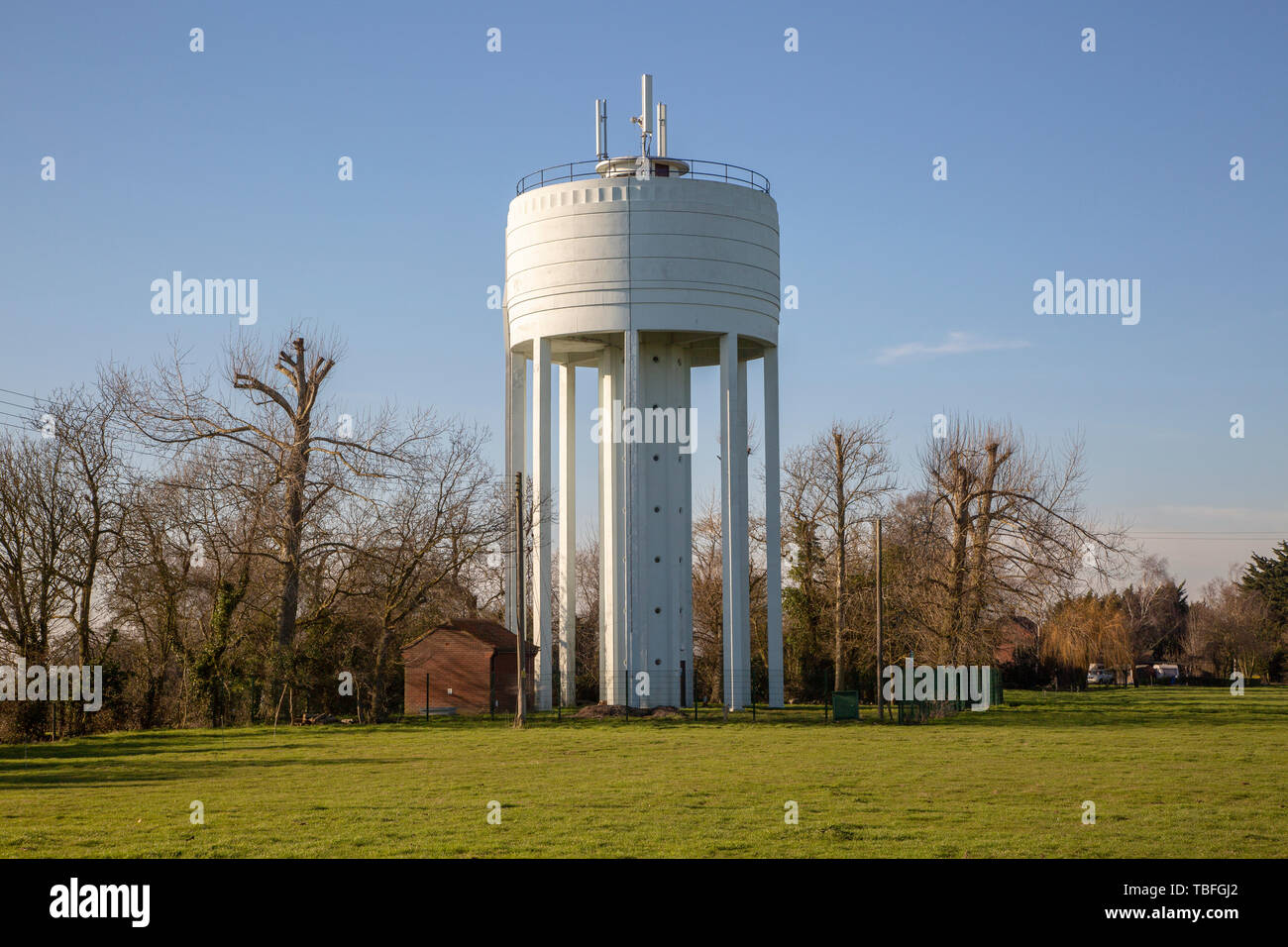 White concrete water storage tower at St Michael South Elmham, Suffolk ...