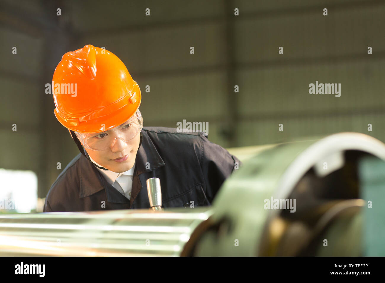 Manufacturing workers work in the workshop Stock Photo - Alamy