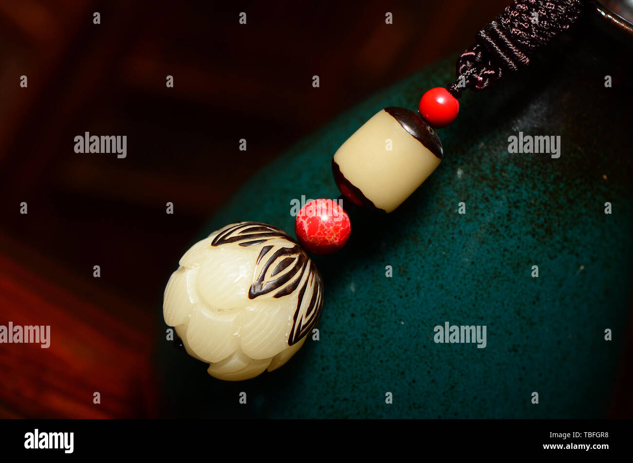 Bodhi pendant, necklace, wool chain Stock Photo - Alamy