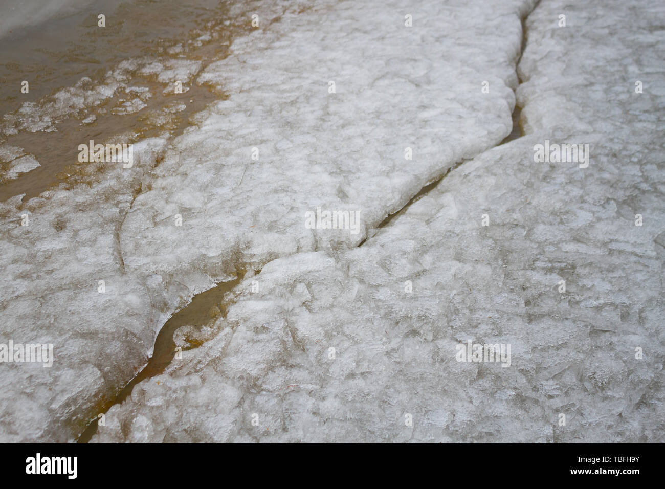 cracked ice on river in spring. danger concept Stock Photo - Alamy