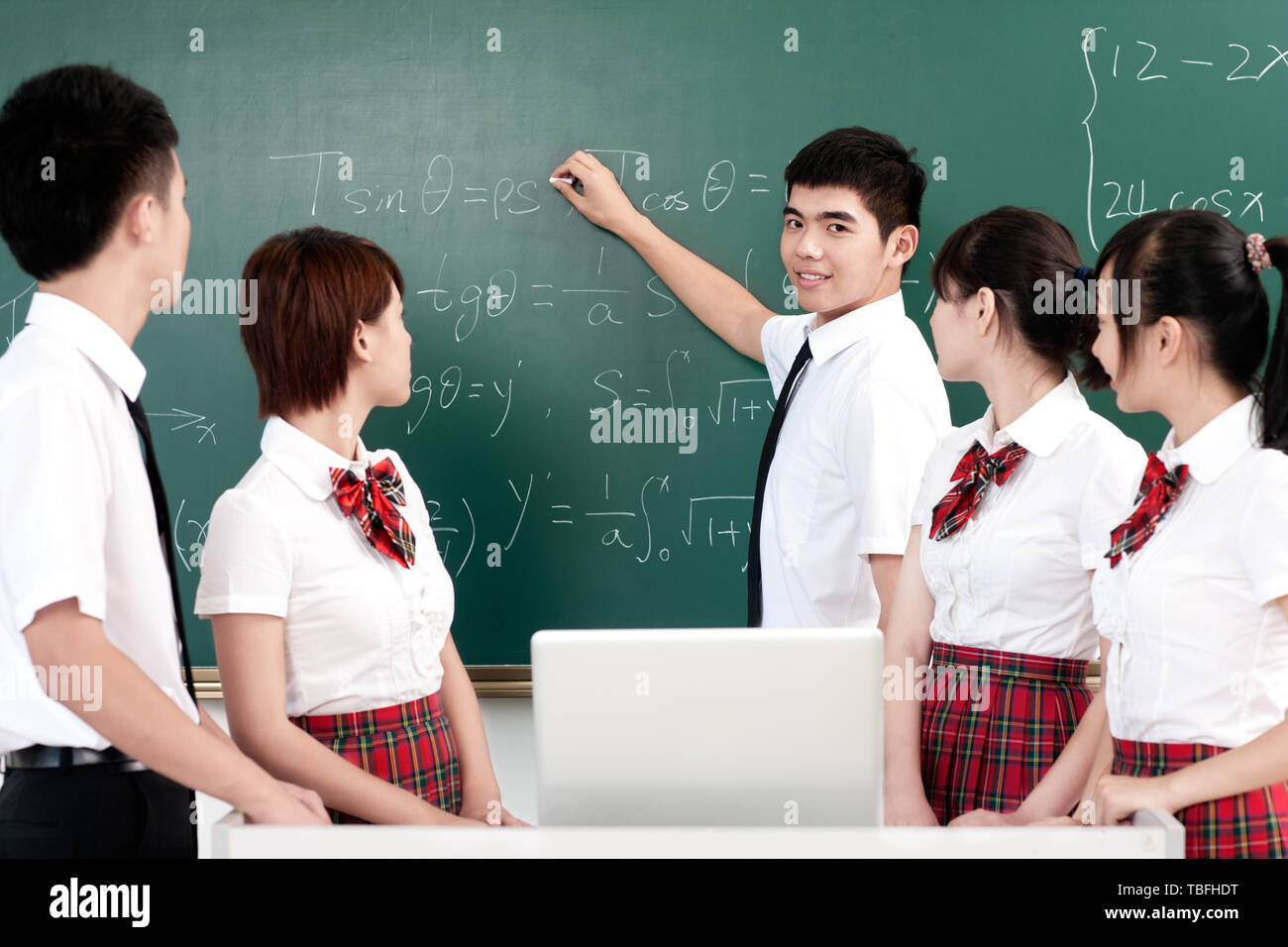 Teamwork among high school students Stock Photo - Alamy