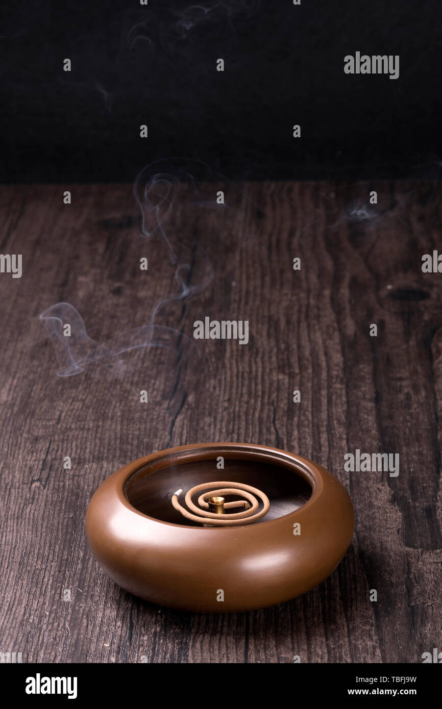 Copper incense stove Stock Photo - Alamy