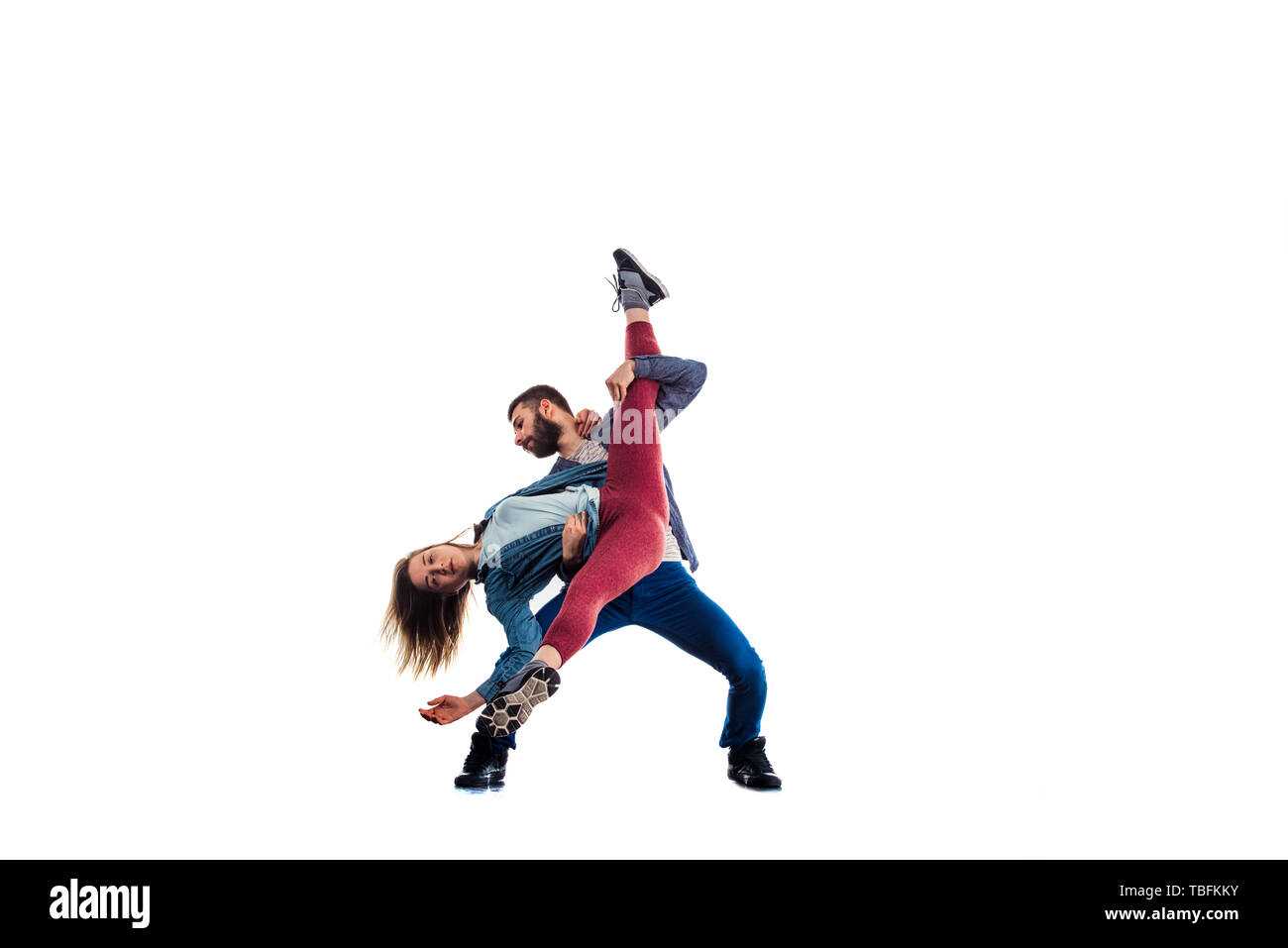 Young man and woman dancing together Stock Photo - Alamy