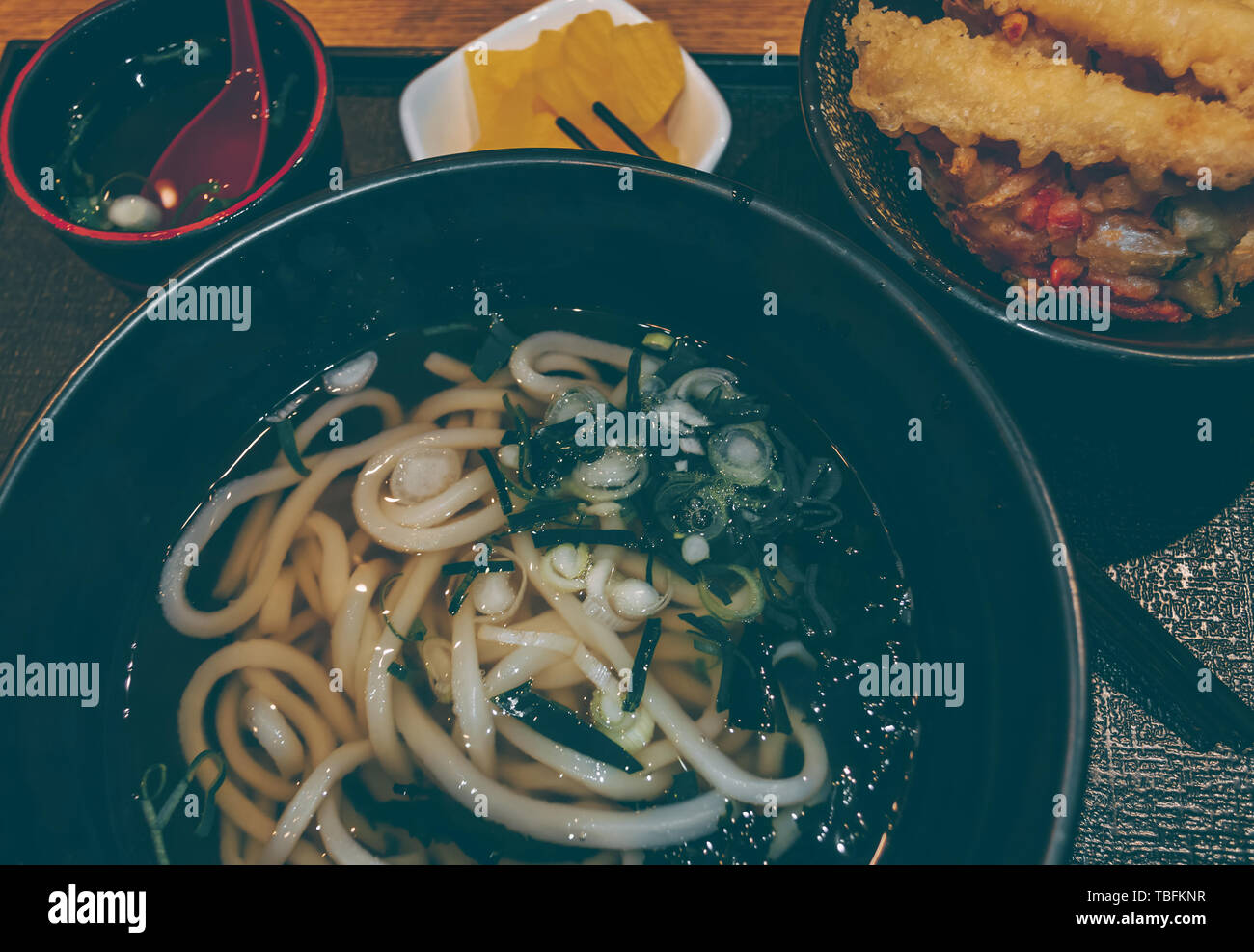 close up view of freshly made ramen with fried shrimps and marinated ...