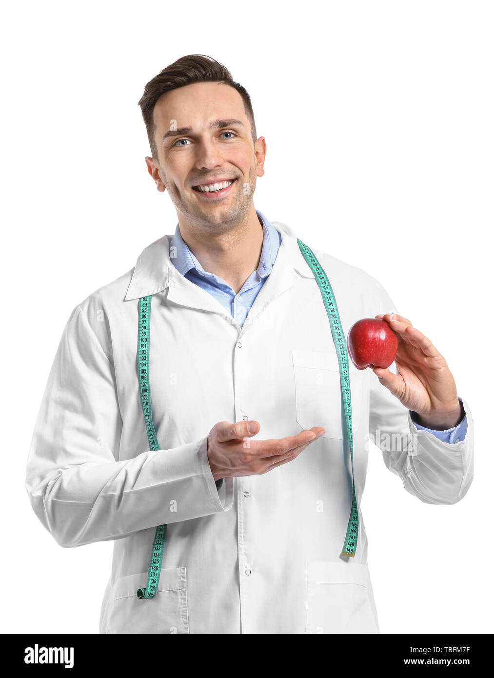 Portrait of male nutritionist on white background Stock Photo - Alamy