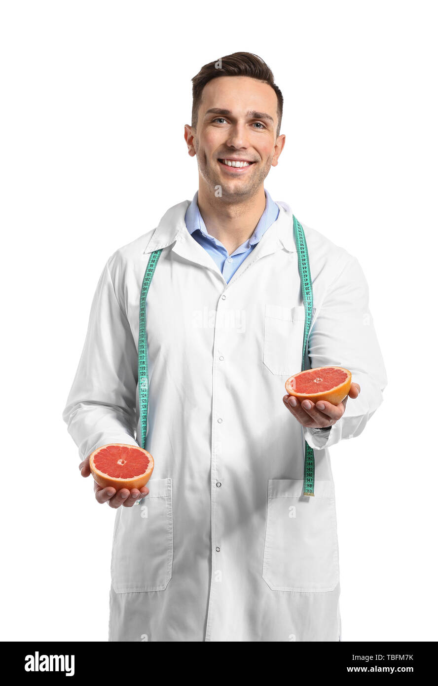 Portrait of male nutritionist on white background Stock Photo - Alamy