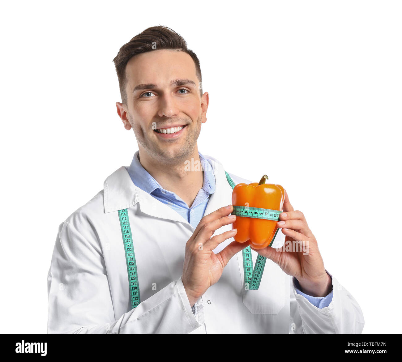 Portrait of male nutritionist on white background Stock Photo - Alamy