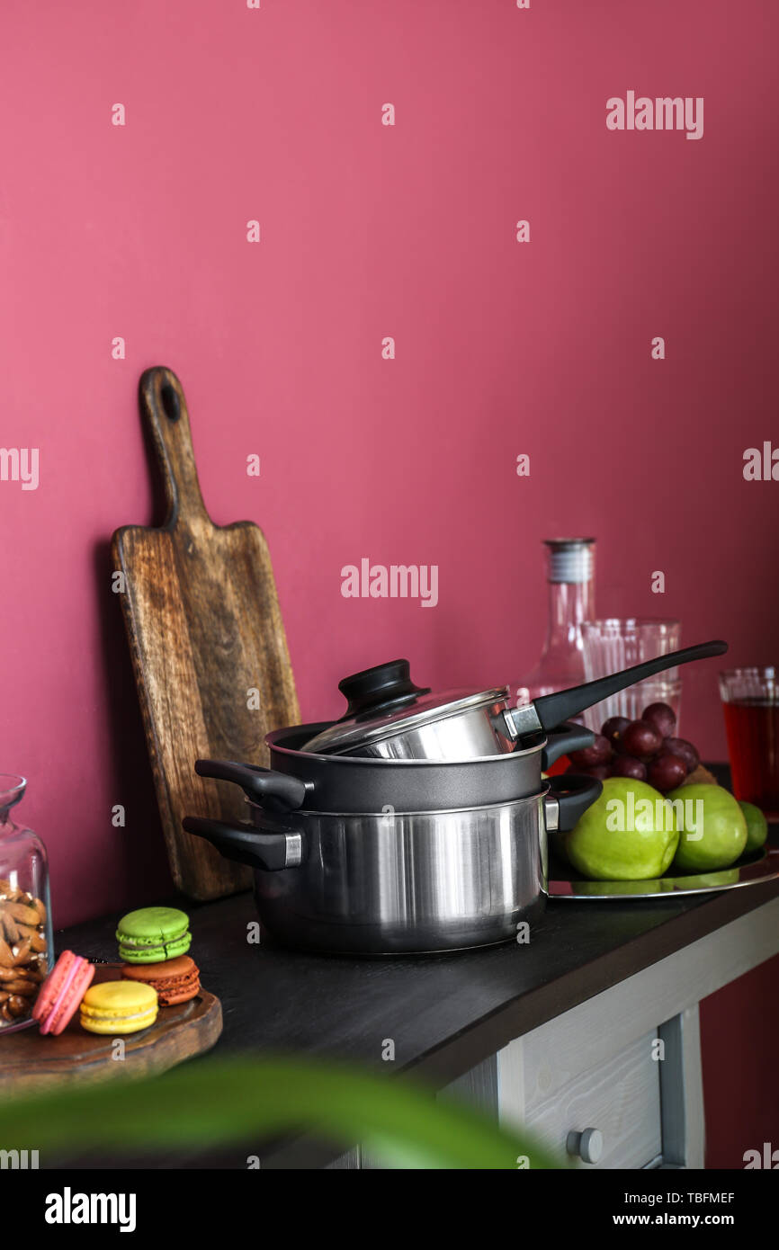 Set of utensils with products on table in kitchen Stock Photo - Alamy