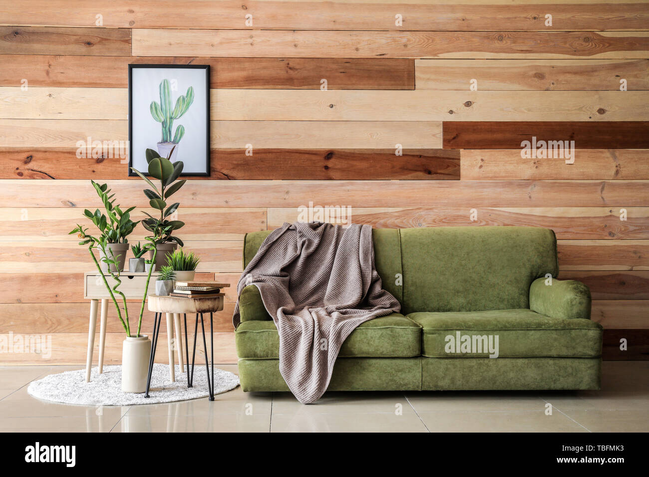 Interior of modern comfortable room with wooden wall Stock Photo - Alamy