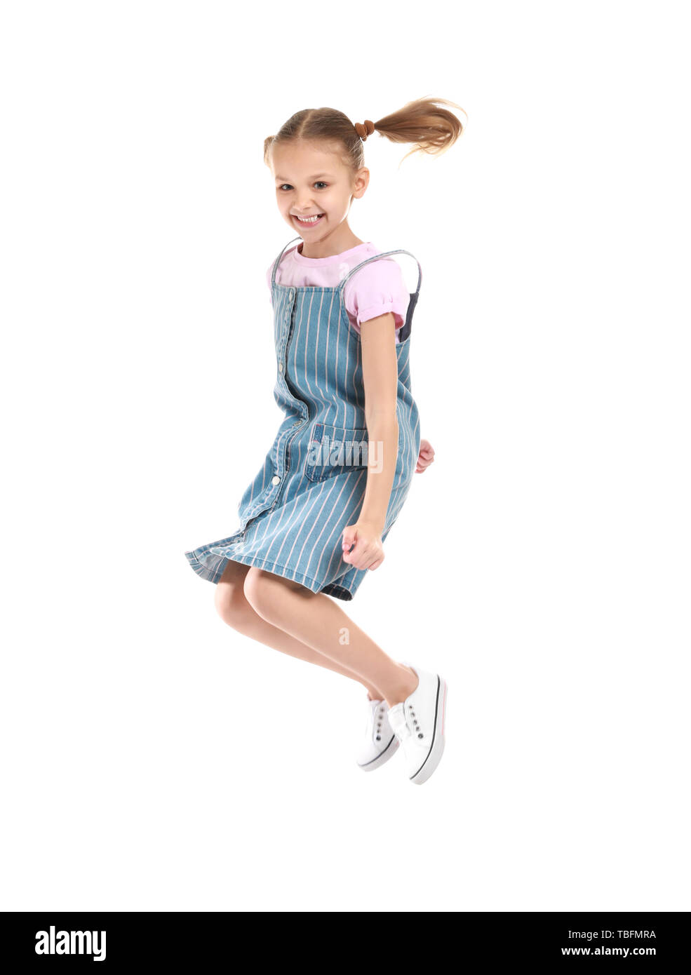 Funny jumping girl on white background Stock Photo - Alamy