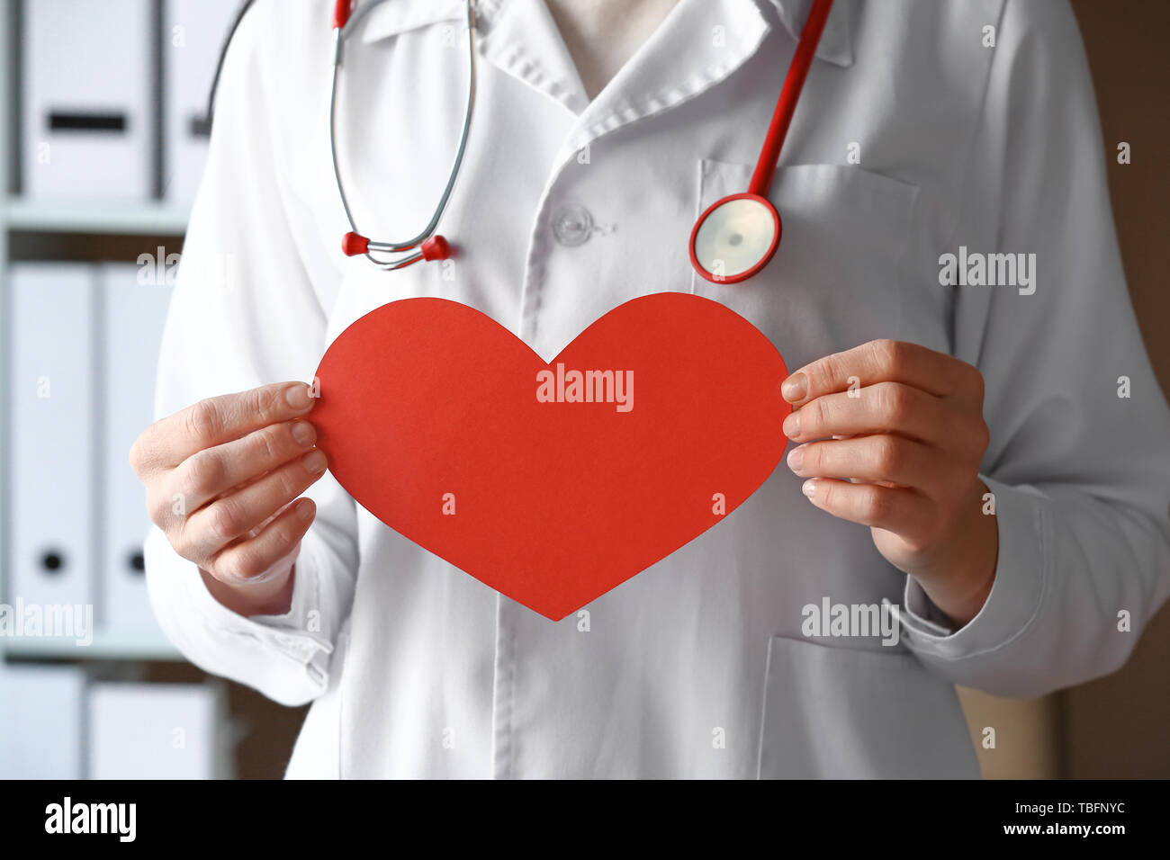 Female doctor paper heart hi-res stock photography and images - Alamy